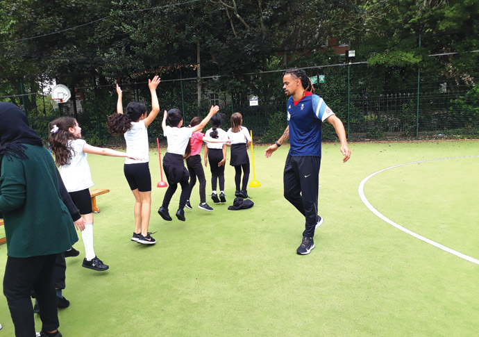 Fast learners! Pupils put through their paces by sprint star ...